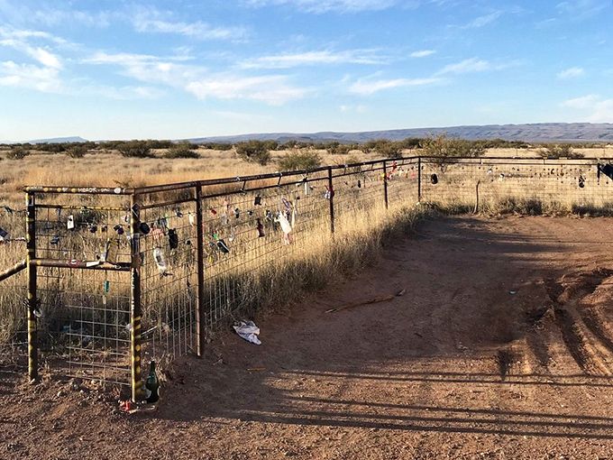The fence surrounding Prada Marfa has become its own art installation&mdash;a patchwork of mementos from visitors making their mark on this surreal landmark.