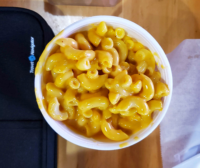 This mac and cheese isn't just a side&mdash;it's a strategic defense system against the chicken's heat assault. Creamy, cheesy tactical support.