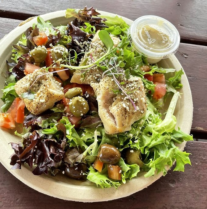 Even the salads here mean business. Fresh greens playing host to perfectly cooked fish&mdash;proof that "eating light" doesn't mean sacrificing flavor.