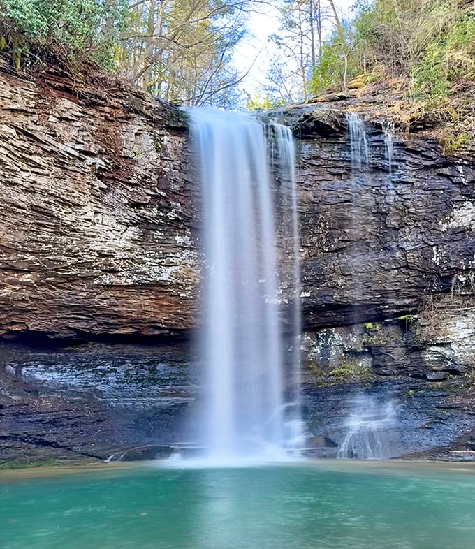 This waterfall doesn't just cascade—it hypnotizes. The kind of view that makes you forget about your phone for a solid twenty minutes.