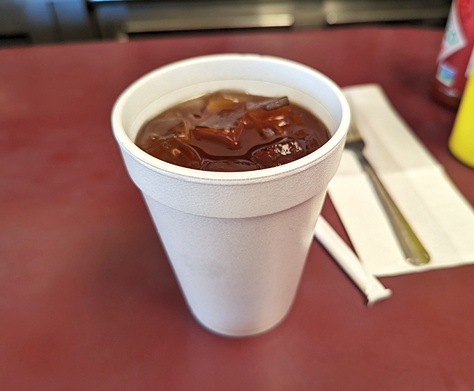 That styrofoam cup might not be Instagram-worthy, but the iced tea inside delivers exactly what you need alongside your burger feast &ndash; no filters required.