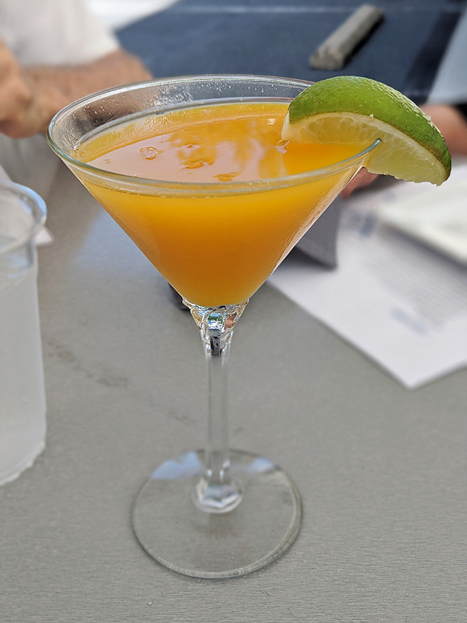 This isn't just a mango martini&mdash;it's liquid sunshine in a glass, with that lime wedge adding just the right amount of tropical sass.