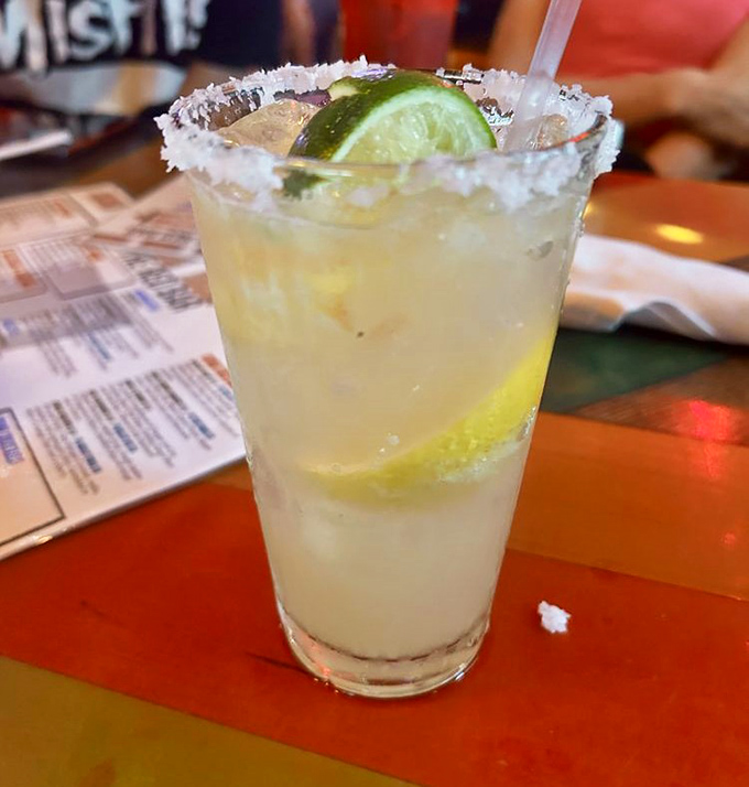 A proper margarita with salt-crusted rim and fresh lime&mdash;the kind that makes you forget about your mortgage and remember why you moved to Florida.