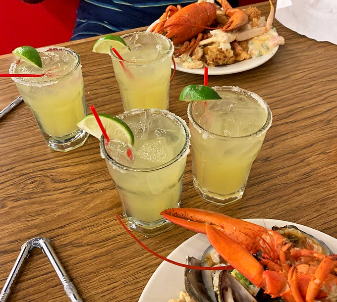 Nothing complements cracking crustaceans like these salt-rimmed margaritas – liquid sunshine to wash down oceanic treasures.