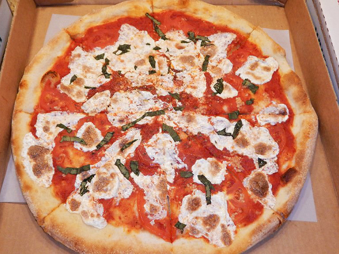 Margherita pizza that channels the spirit of Naples while speaking with a distinct Pennsylvania accent. Simple ingredients, spectacular results.
