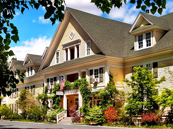 The historic McCloud Hotel blooms with summer color, its grand architecture a reminder that lumber barons once brought Victorian elegance to this mountain outpost.