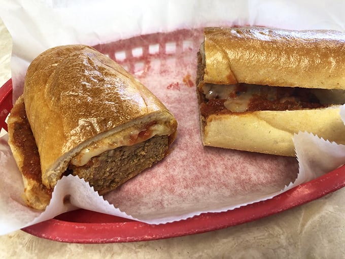 The meatball parm that makes grandmothers nervous. That golden-brown roll cradles its saucy contents like it was born for this purpose.