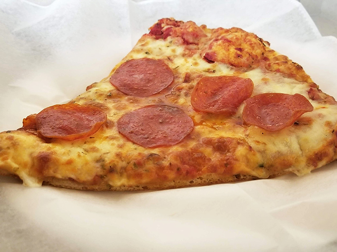 Even the pizza holds its own in this sandwich kingdom. Sometimes you just need a slice of cheesy comfort alongside your burger.