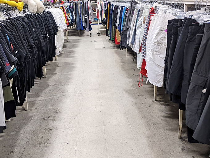 The men's department: a corridor of sartorial second chances. Where business casual meets casual business in a negotiation that always favors your wallet.