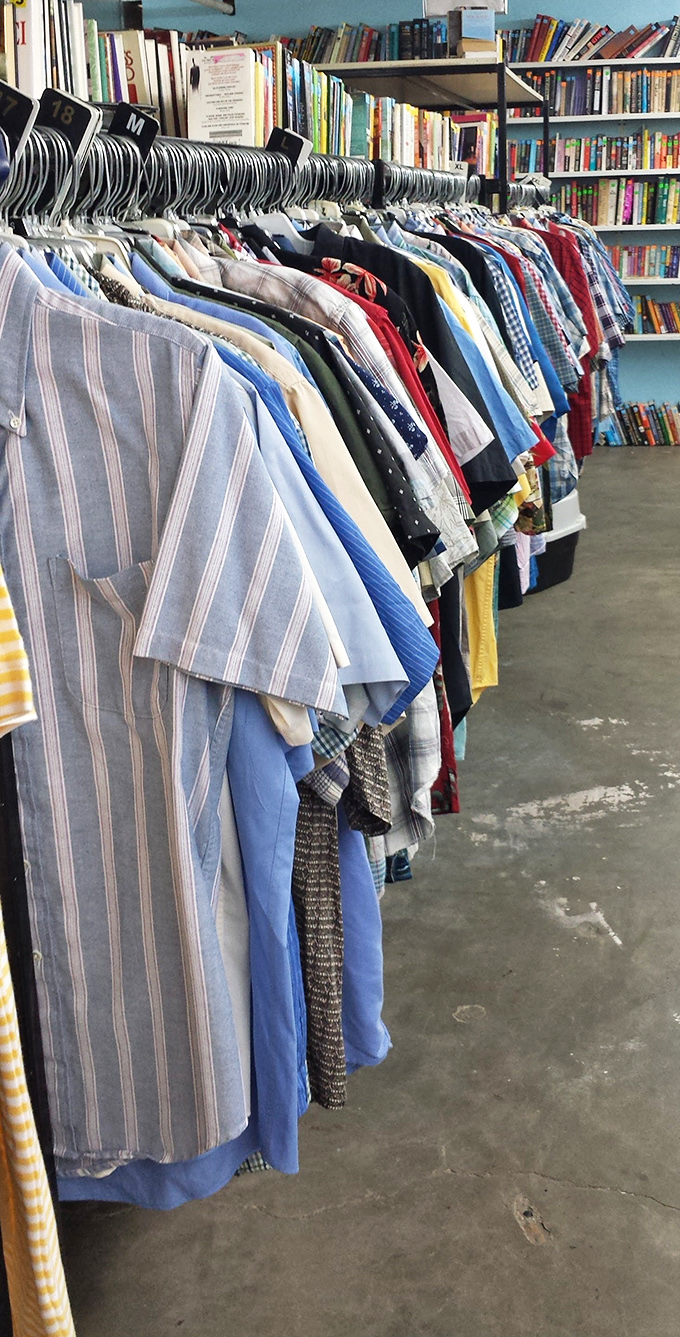 Men's shirts lined up like soldiers, each with a different story to tell. That blue striped oxford might have once attended important meetings or casual Sunday brunches.