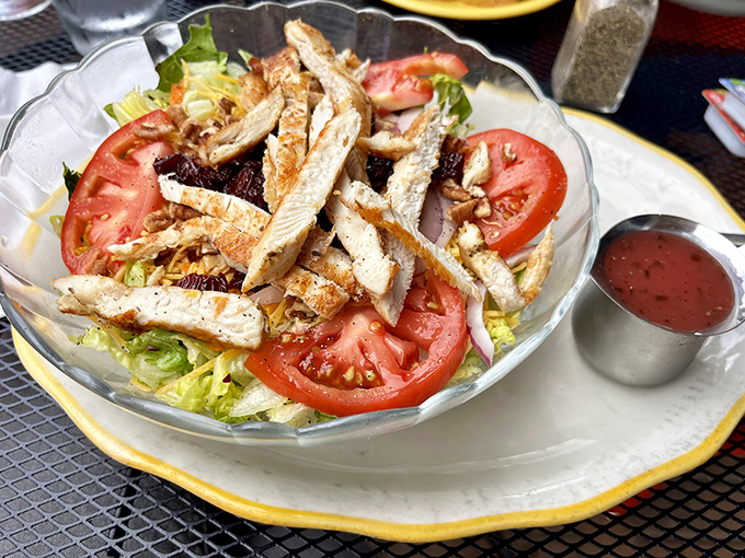 A chicken salad that proves healthy eating doesn't have to be punishment. Fresh greens, juicy tomatoes, and grilled chicken that didn't come from the freezer section.