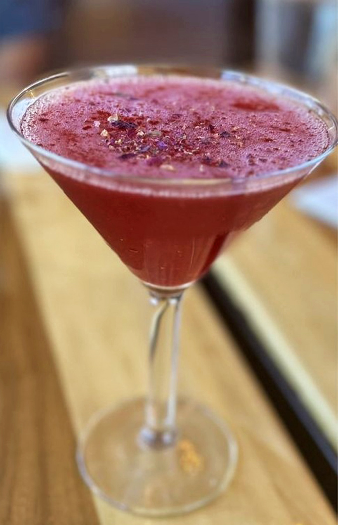 This isn't just a cocktail; it's liquid ruby with attitude. The kind of drink that makes you feel sophisticated even if you're wearing flip-flops.