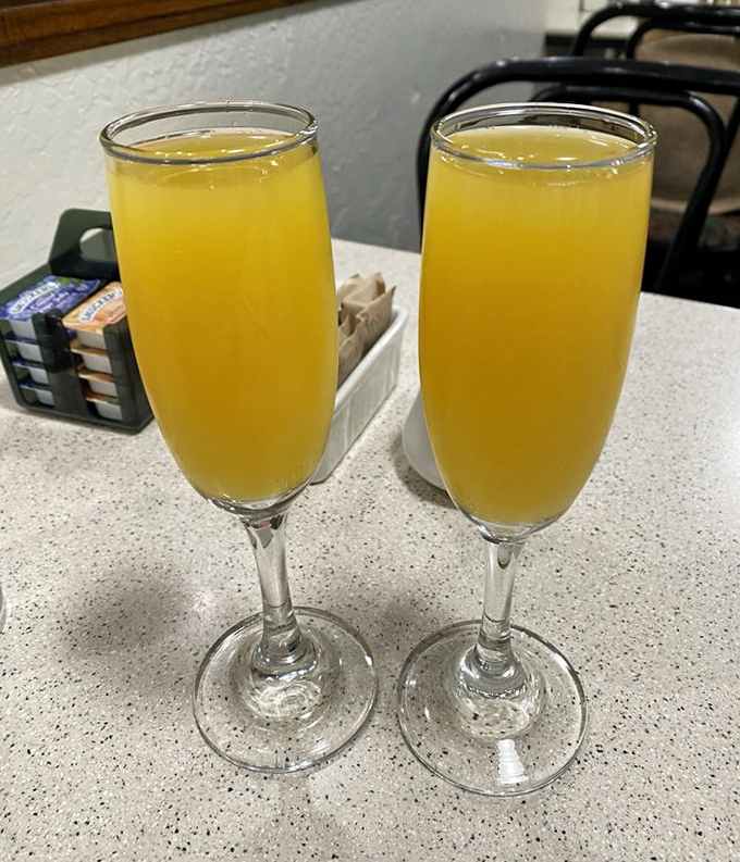 Weekend mimosas at Kathleen's – where sunshine gets bottled, slightly buzzed, and served in elegant flutes. Breakfast's perfect companion.