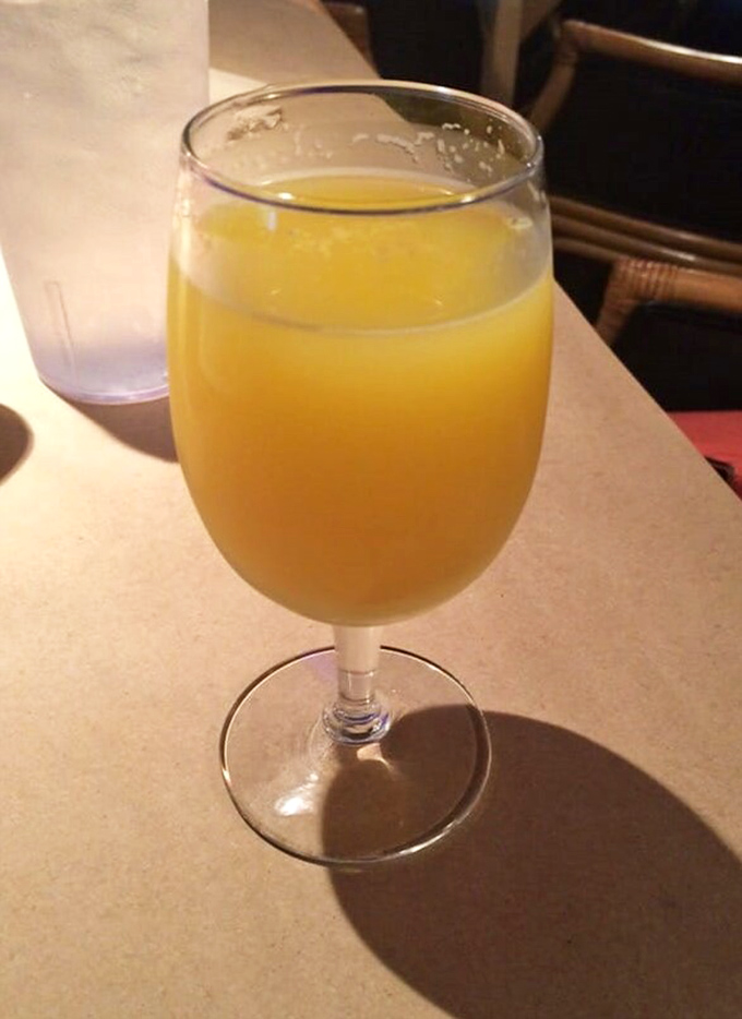 Sunshine in a glass! Their mimosas bring weekend vibes any day of the week&mdash;the perfect companion to seafood indulgence.