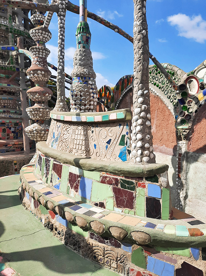 The devil's in the details: up close, you can see how seashells, tiles, and bottle fragments come together in a symphony of texture and color.