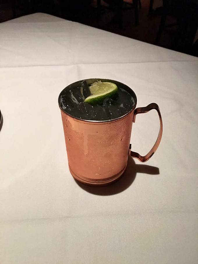 This Moscow Mule isn't just served in copper—it's delivering liquid sunshine with each sip, that lime wedge winking at you like an old friend.