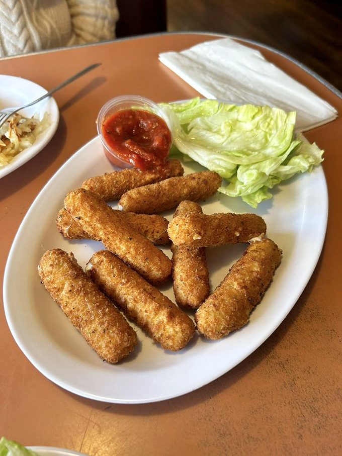 Mozzarella sticks: the adult version of string cheese that somehow tastes even better when dipped in marinara at 2 AM.