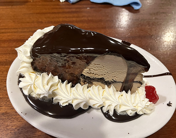 Mud pie that's worth every calorie and gym session you'll need afterward. Chocolate and ice cream: nature's perfect apology for Mondays.