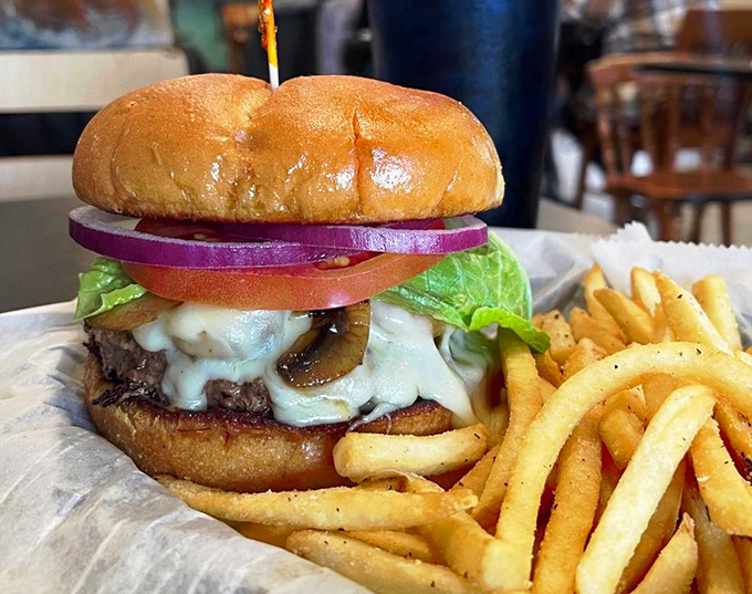 When a burger wears mushrooms and Swiss like a tailored suit, you know you're in the presence of sandwich royalty.