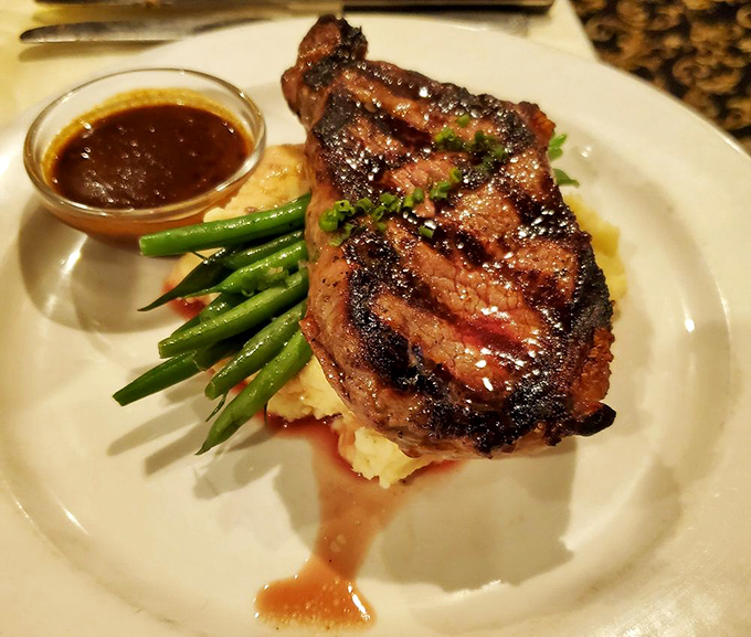 When a steak is cooked this perfectly, the sauce becomes optional&mdash;though that rich demi-glace is practically begging to join the party.