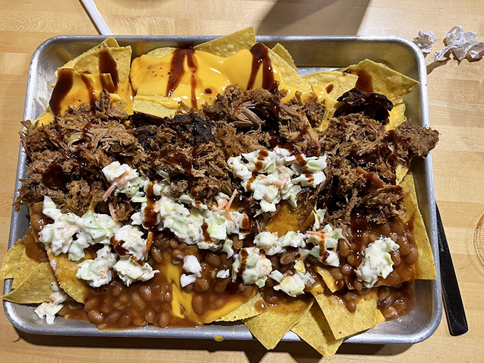 These aren't your average ballpark nachos. They're a full-fledged barbecue party where chips are merely the well-dressed guests.