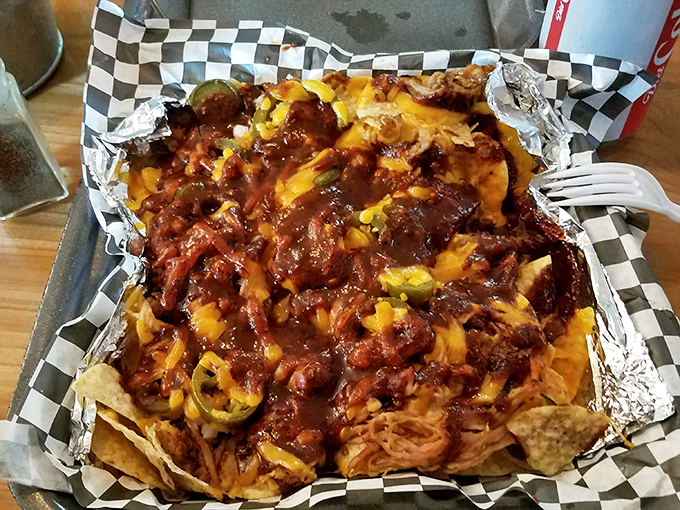BBQ nachos that laugh in the face of conventional appetizers. The melted cheese and pulled pork create a beautiful mess worth every napkin.