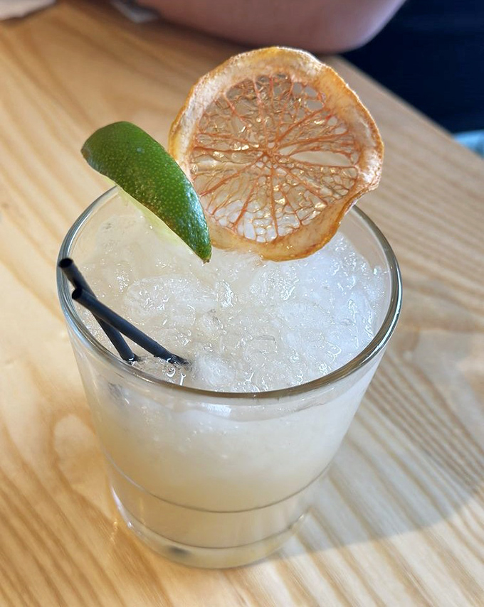 This cocktail isn't just a morning beverage&mdash;it's liquid sunshine with a dehydrated citrus halo that makes "it's 5 o'clock somewhere" completely irrelevant.