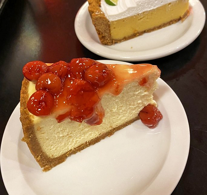 Cheesecake topped with cherry compote&mdash;where New York tradition meets Midwestern hospitality on a plate that won't judge you for licking it clean.