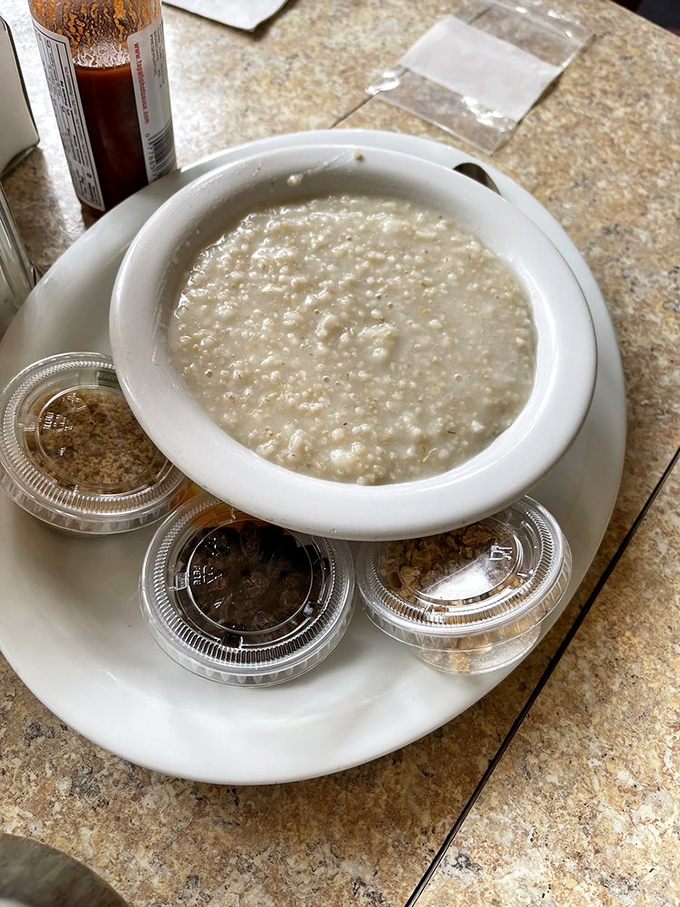 Oatmeal that makes you question why you ever ate the instant stuff. Simple, honest comfort with little containers of mix-ins standing by like breakfast bodyguards.