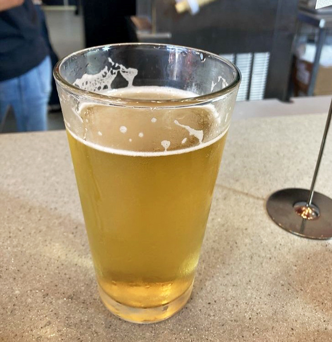 Nothing complements a slice like a cold one&mdash;this golden lager is the perfect supporting actor in the delicious drama unfolding on your table.