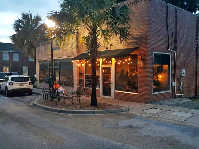 Evening glow transforms this corner tavern into Beaufort's living room. Where locals and visitors alike discover that Southern hospitality comes in liquid form too.
