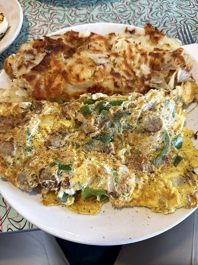 This isn't just an omelet&mdash;it's a masterclass in morning architecture, with each ingredient playing its perfect role in the breakfast symphony.