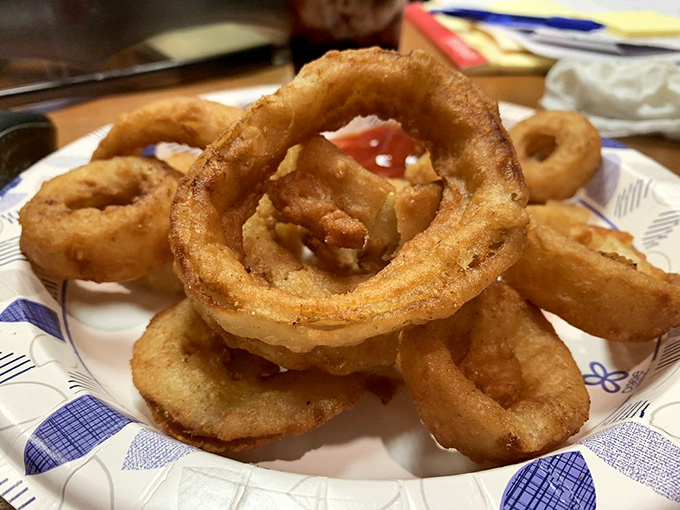 Golden, crispy onion rings with that perfect crunch-to-tender ratio&mdash;the supporting actor that sometimes steals the show from the burger stars.