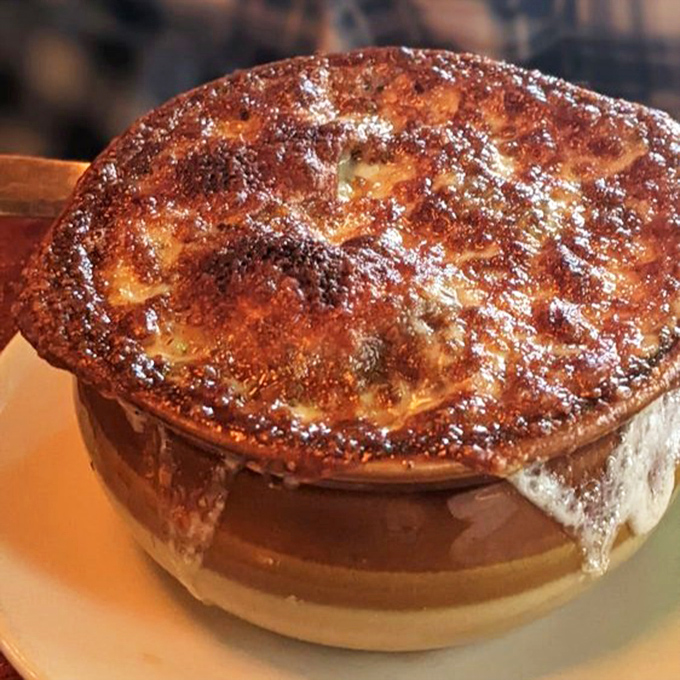 French onion soup with a cheese pull that deserves its own Instagram account&mdash;a bubbling cauldron of comfort that's worth the wait.