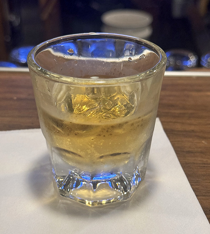 Sometimes the simplest pleasures are the best—like this amber-colored whiskey waiting patiently to complement your meal or help you digest the enormity of what you just experienced.