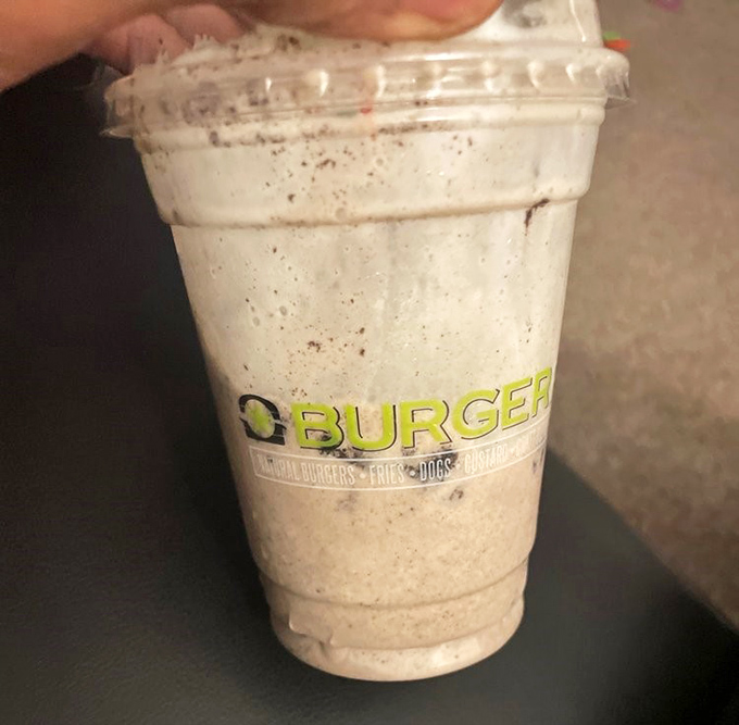 An Oreo milkshake so thick your straw becomes a workout tool, but every sip rewards the effort.