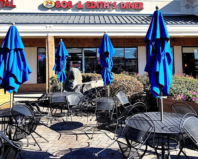 Even diners need vitamin D. The outdoor seating area offers blue umbrellas and fresh air—a perfect spot for people-watching between bites.