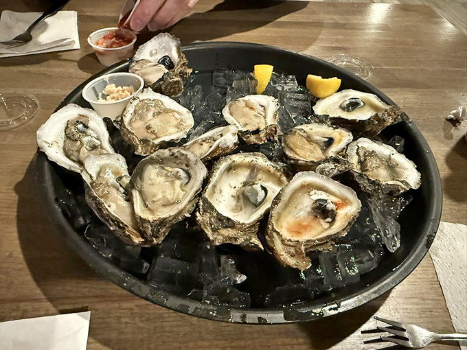 Fresh oysters on ice, waiting for their moment to shine &ndash; nature's perfect little flavor bombs.