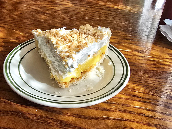 Cream pie that makes you question why you've wasted time on lesser desserts. That graham cracker crust deserves a Nobel Prize in deliciousness.