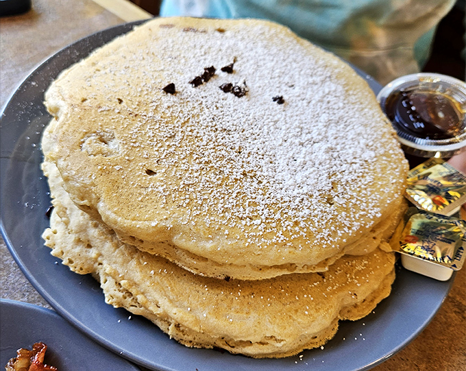 These pancakes aren't just big&mdash;they're "I'll-have-to-skip-lunch" big, dusted with powdered sugar like the first perfect snowfall of winter.