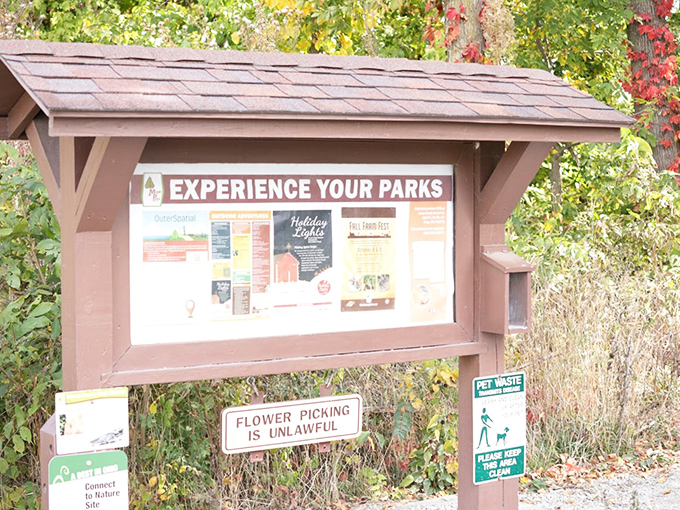 Park rules sign gently reminding visitors that flower picking is unlawful, because "Instagram moment" is not a valid defense in nature court.