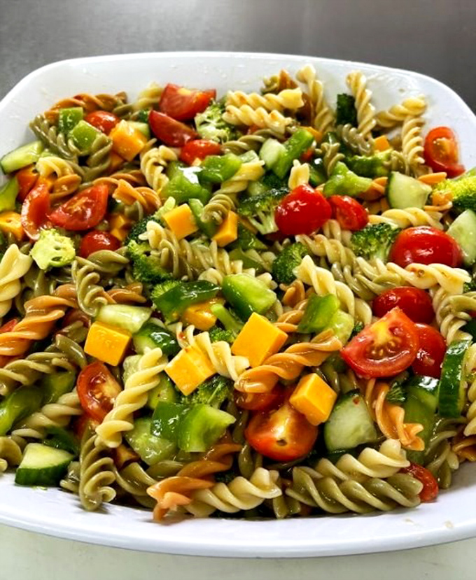 A pasta salad rainbow that proves healthy can be beautiful. Crisp vegetables and al dente pasta create a side dish that's refreshing enough to make you momentarily forget about pie.