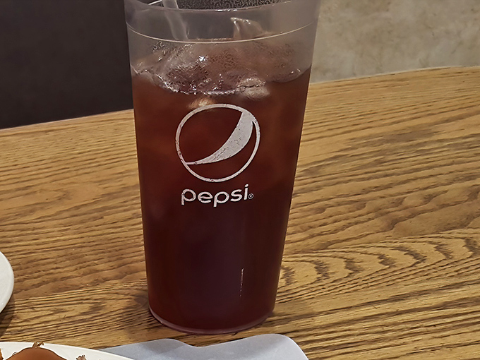 In small-town diners, a tall, ice-cold Pepsi isn't just a beverage—it's a supporting character in the theater of comfort food.