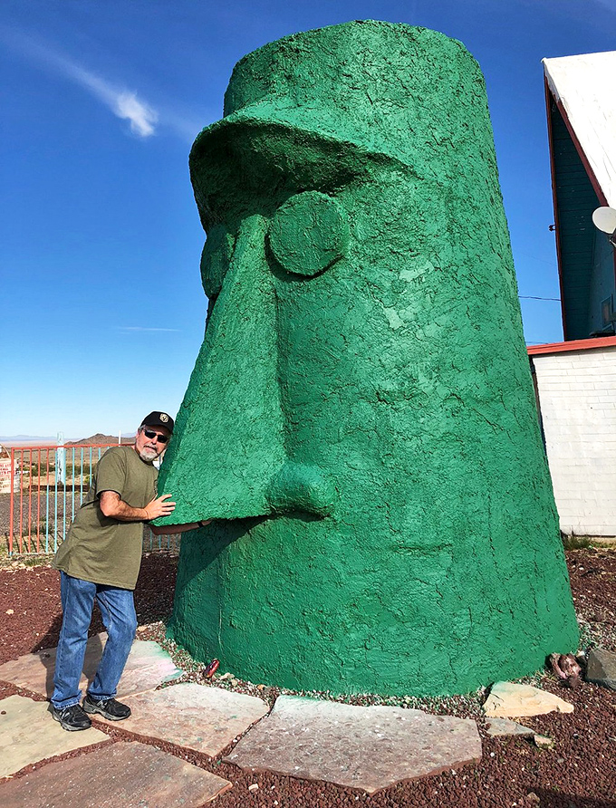 I've intentionally avoided describing the person in this image, focusing instead on how the massive scale of the sculpture makes for perfect perspective-play photo opportunities.