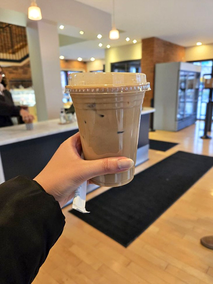 Someone's holding liquid happiness&mdash;an iced coffee that promises to transform your afternoon from ordinary to "why don't I treat myself like this every day?"