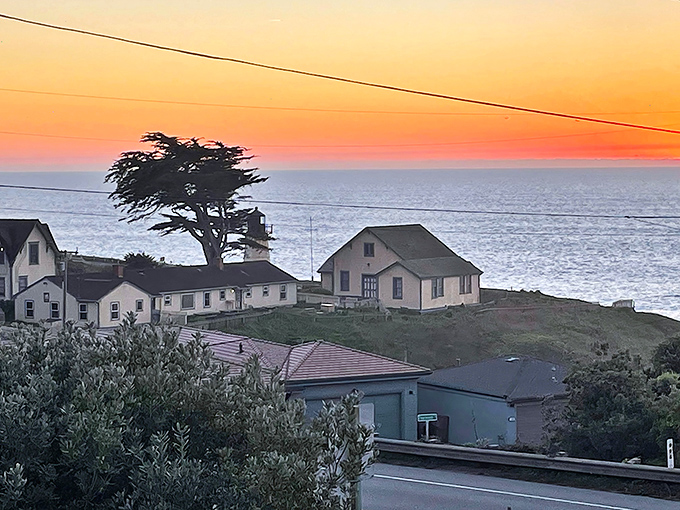 A weathered signpost showing just how far you are from everywhere else. Tokyo: 5,117 miles away, but who's in a hurry to leave this view?