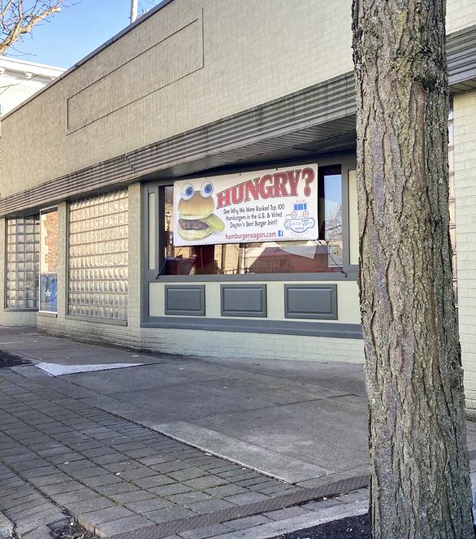 "HUNGRY?" asks the sign, as if anyone could walk past the aroma of sizzling beef and answer "no." That's like declining a winning lottery ticket.