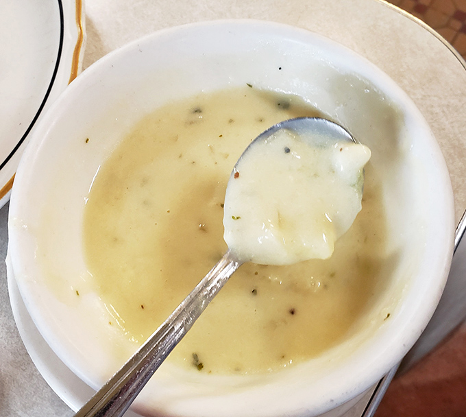 A steaming bowl of potato soup that proves sometimes the simplest things are the most satisfying. Spoon not included, but highly recommended.