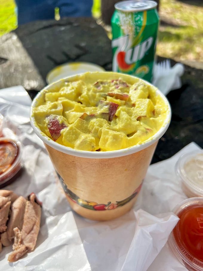 Potato salad that's dressed for success! Those bits of red pepper and egg are like confetti celebrating your good decision to order sides.