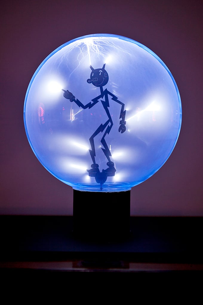 This glowing figure inside an electrified sphere looks like what might happen if lightning decided to take human form for a night on the town.